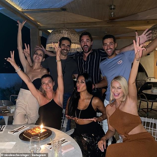 Nicole Scherzinger returns to the sun-drenched Greek isle as she ...